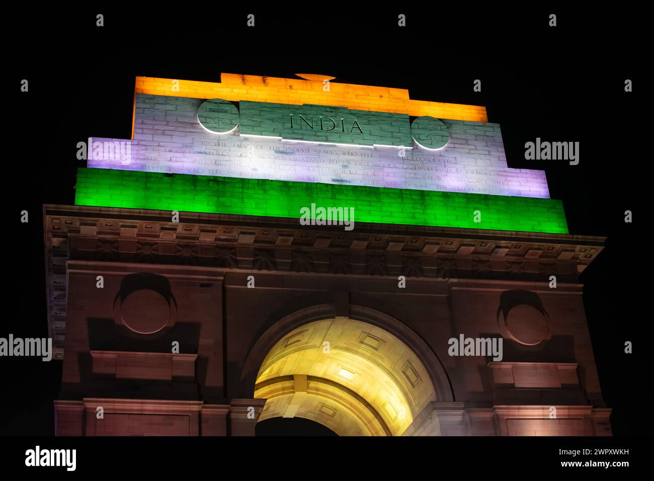 Image of India Gate at night with India flag colors projected on it ...
