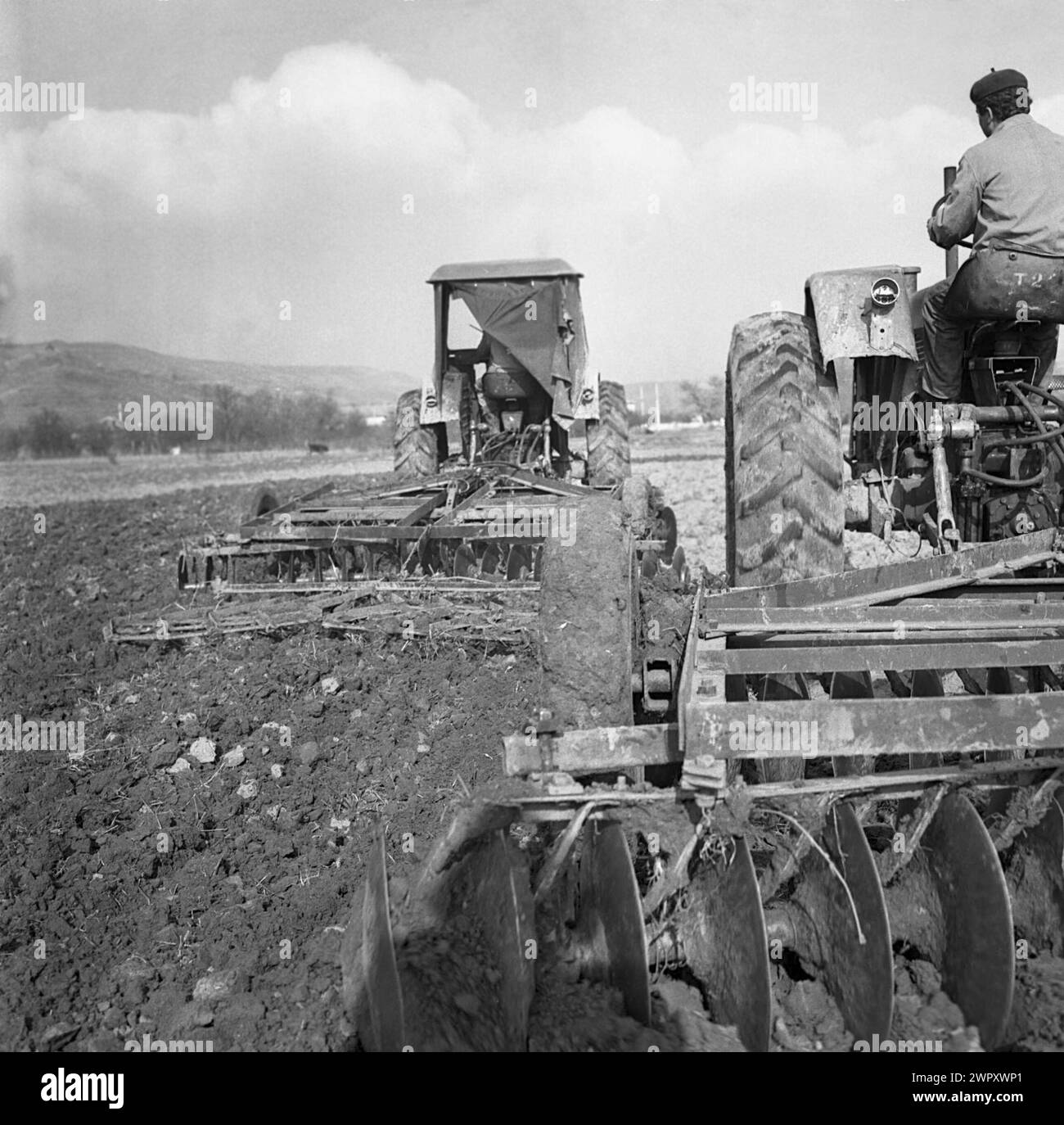 1970s tractor plowing a field Black and White Stock Photos & Images - Alamy