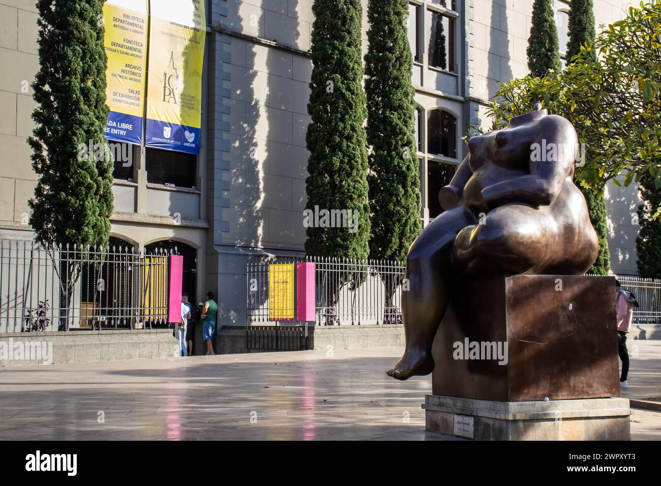 MEDELLIN, COLOMBIA - JANUARY 17, 2024: Seated Woman. Bronze sculptures ...