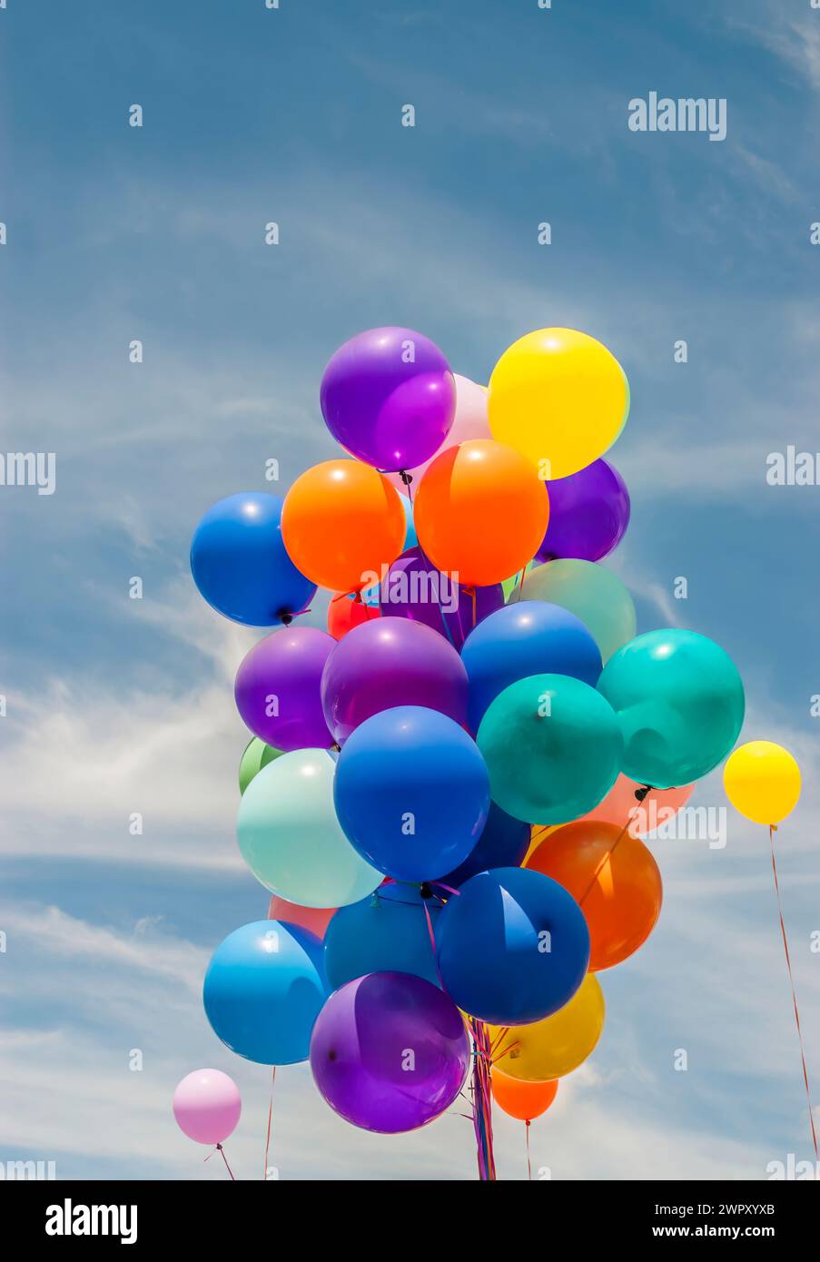 Festive balloons flying in sky hi-res stock photography and images - Alamy