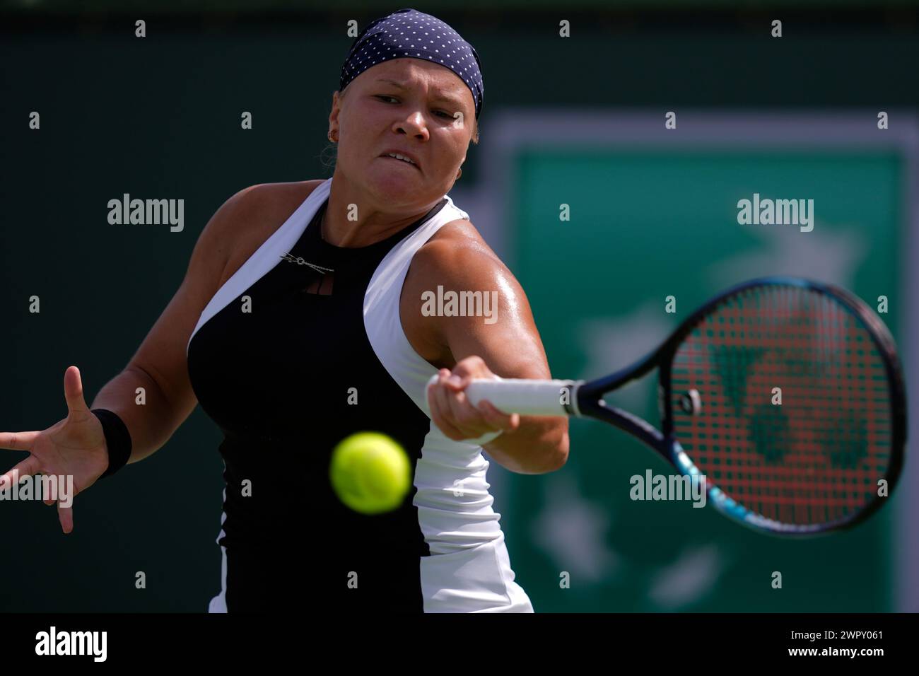 Diana Shnaider, of Russia, returns to Maria Sakkari, of Greece, at the ...