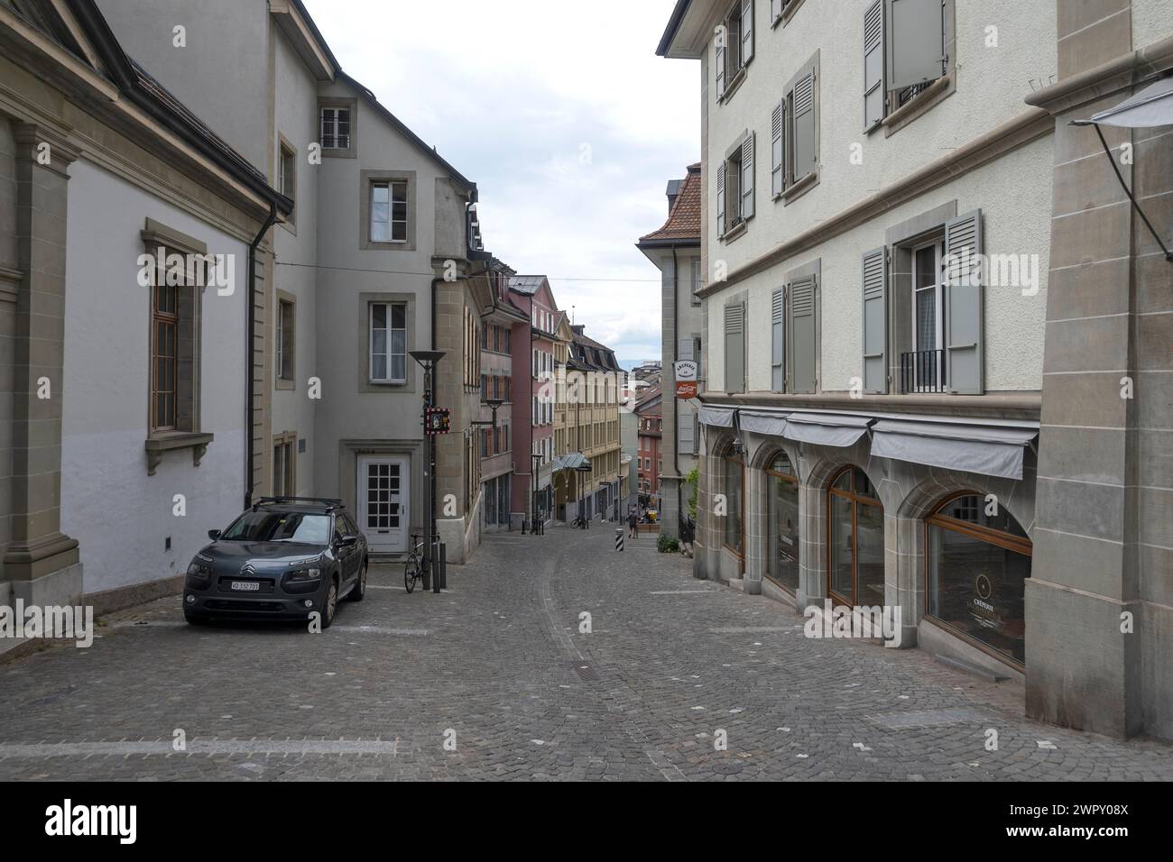 LAUSANNE, SWITZERLAND - JUNE 18, 2023: Typical Building and street at ...