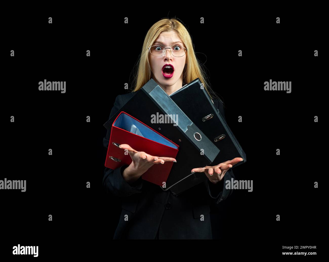 Stressed Secretary deluged by documents. Thoughtful young Secretary ...