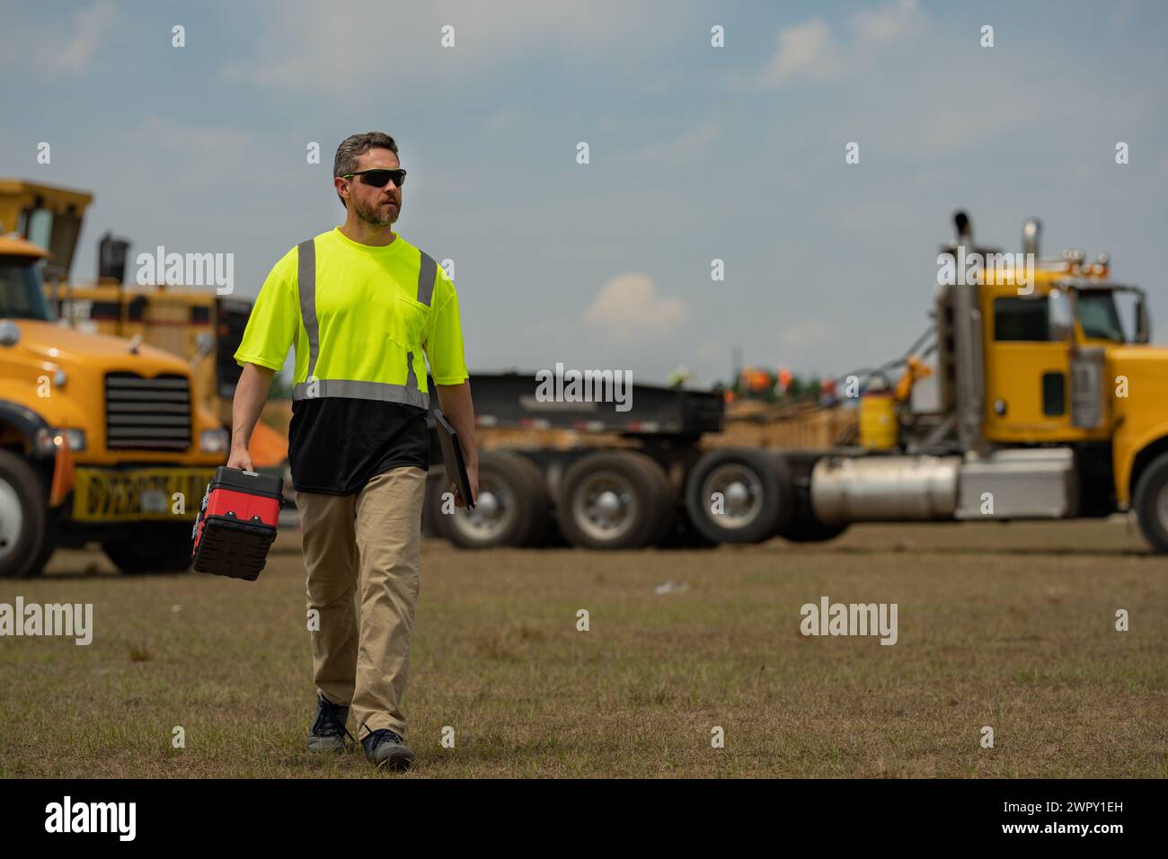 Builder worker with hardhat helmet on construction site. Man in hardhat ...