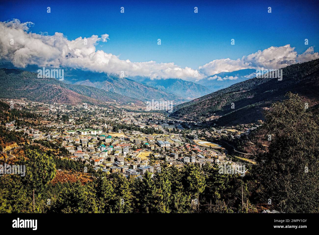 The capital city Thimphu, Bhutan is situated in a Himalayan foothill ...