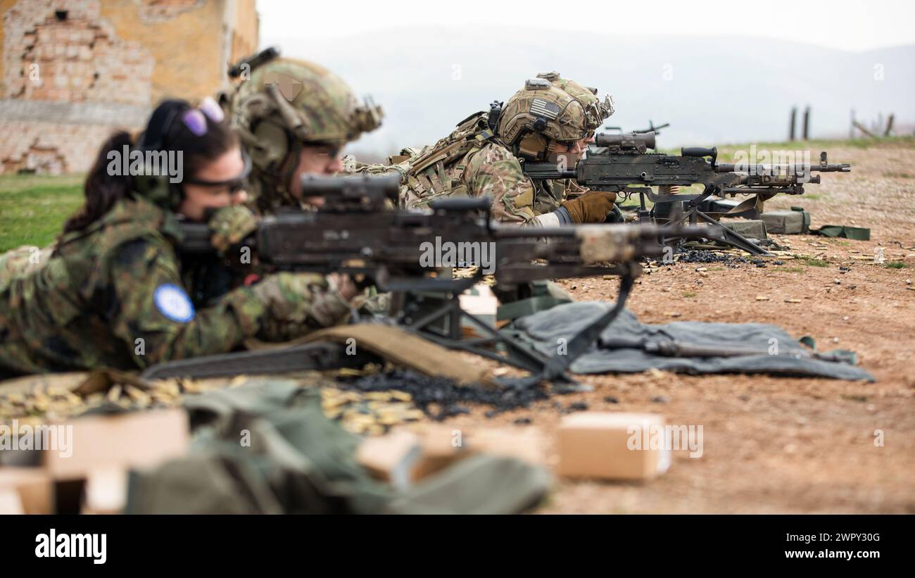 A Bulgarian special operations forces soldier fires the weapon of a U.S ...