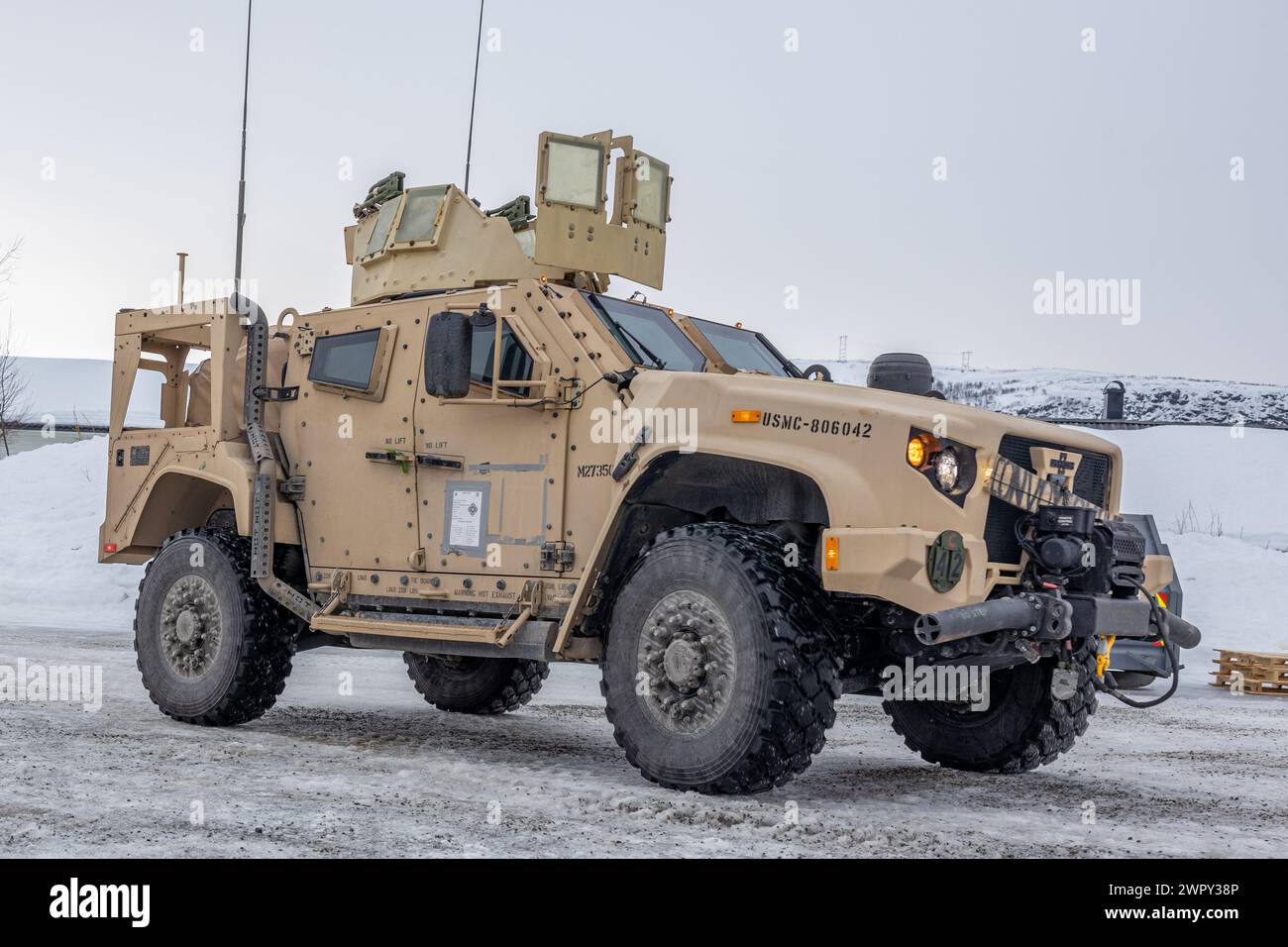 A U.S. Marine Corps joint light-tactical vehicle with Combat Logistics ...
