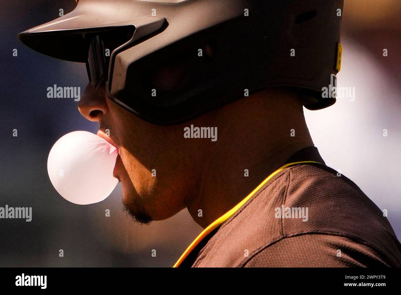 San Diego Padres' Manny Machado blows a bubble during an at-bat against ...
