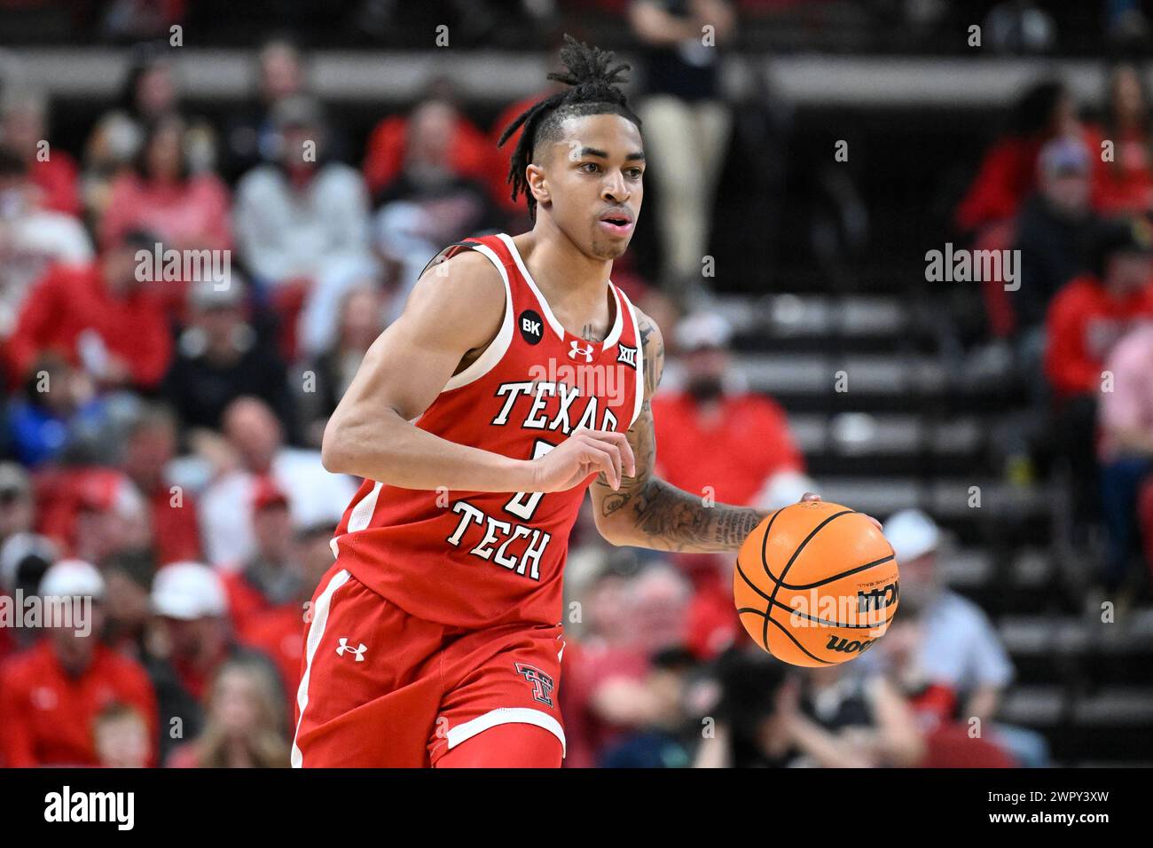 Texas Tech guard Chance McMillian brings the ball up court against ...
