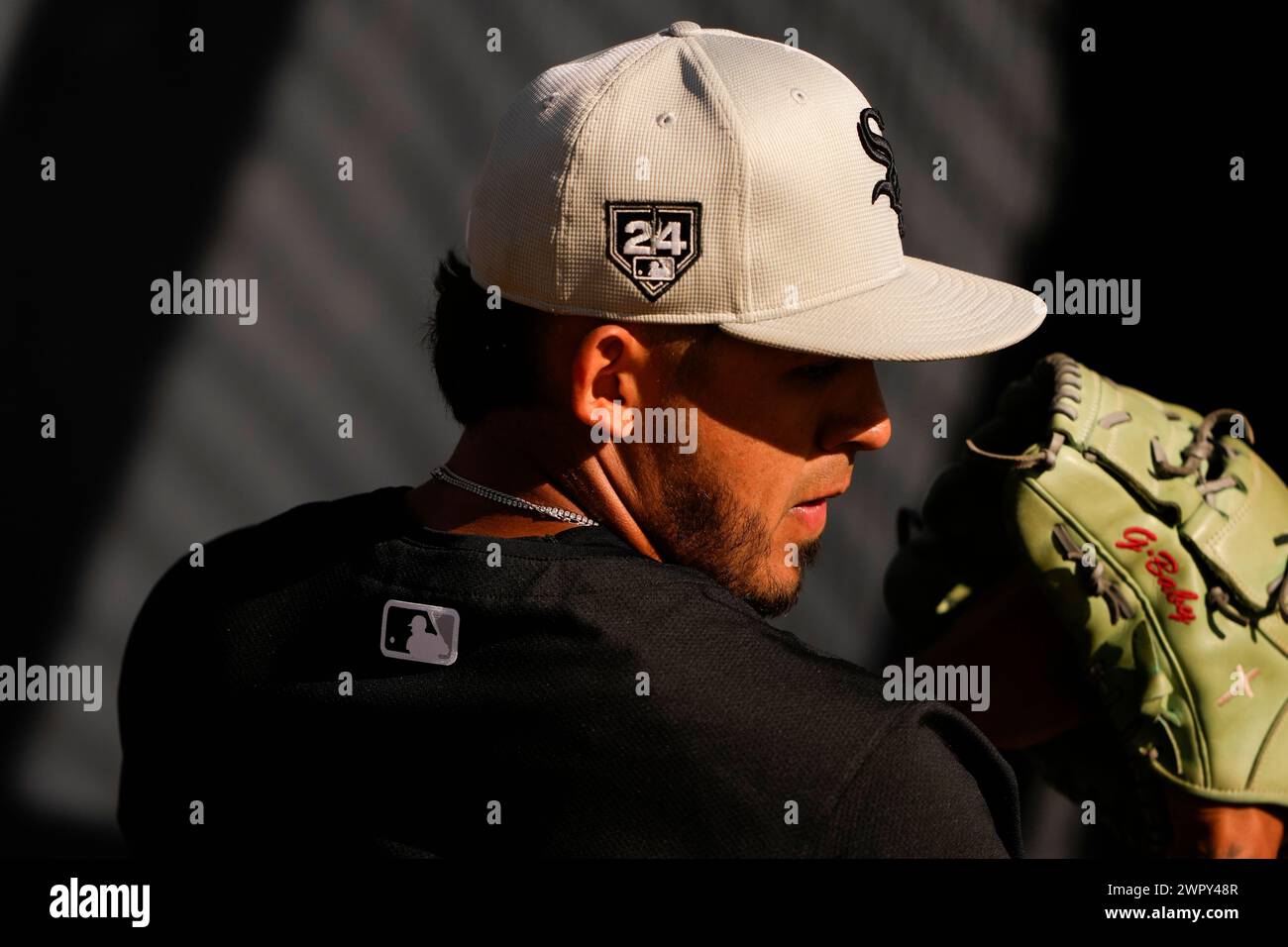 Chicago White Sox pitcher Gil Luna warms up in the bullpen during a ...