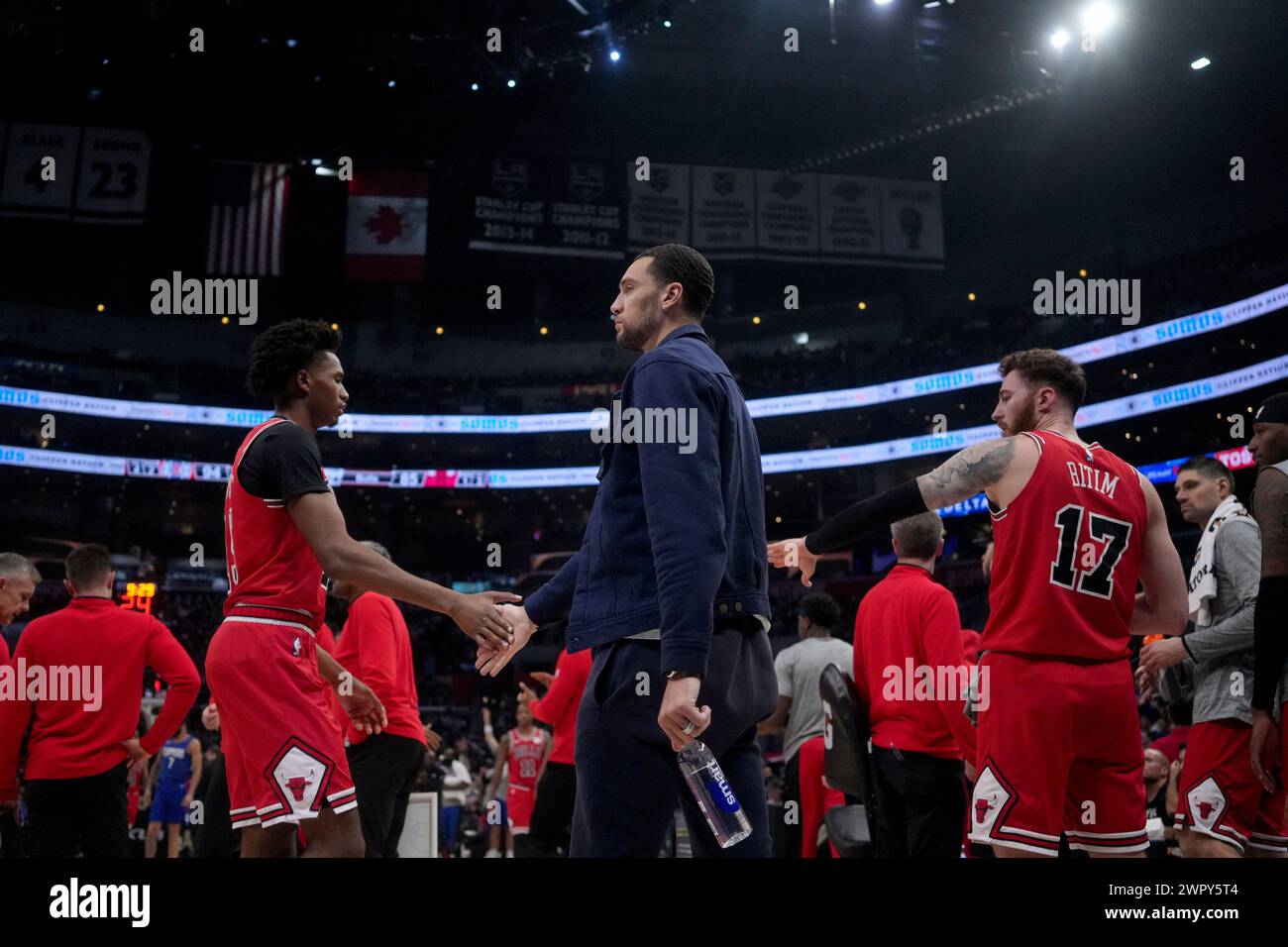 Chicago Bulls guard Zach LaVine, center, slaps hands with teammate ...