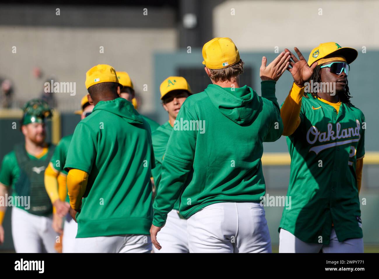 Oakland Athletics outfielder Lawrence Butler, right, high-fives ...
