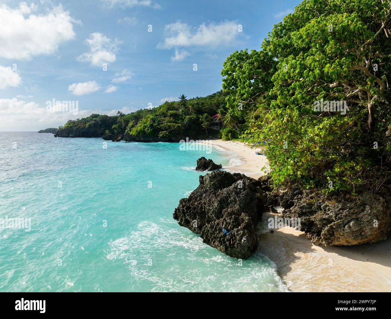 Turquoise sea water and waves in white sand beach in Carabao Island ...