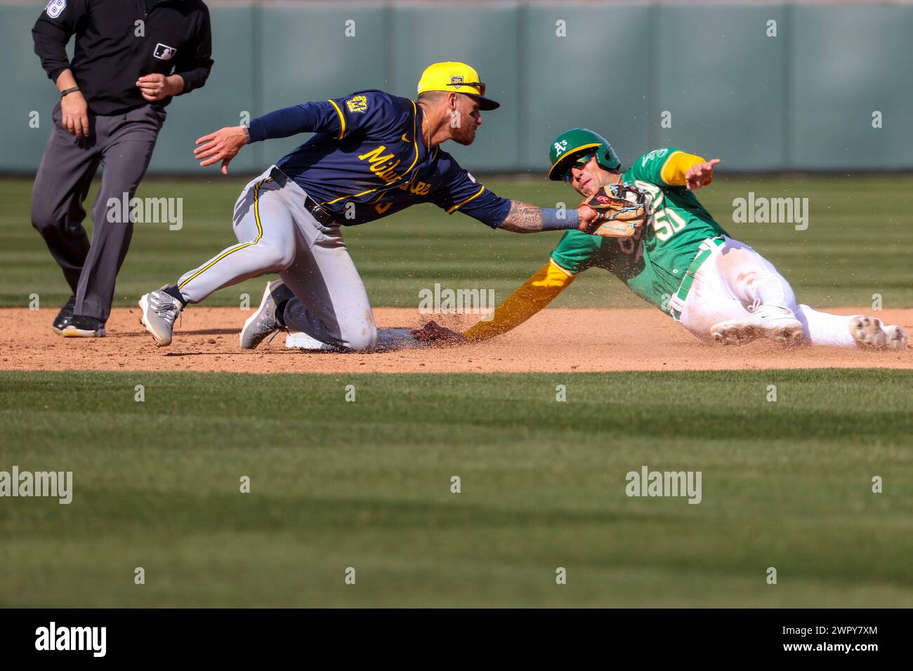 Milwaukee Brewers second baseman Joey Ortiz (3) tags out Oakland ...
