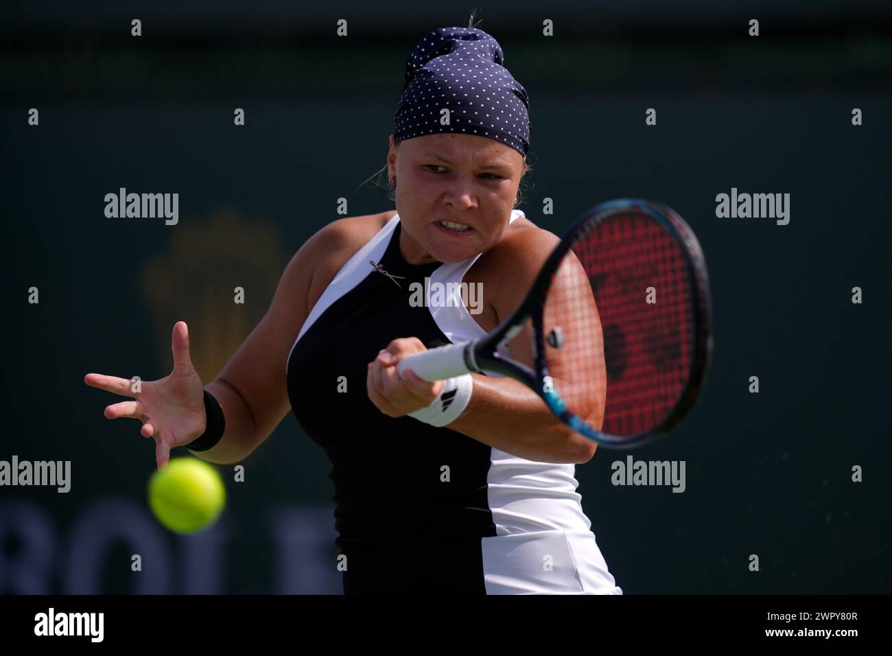 Diana Shnaider, of Russia, returns to Maria Sakkari, of Greece, at the ...