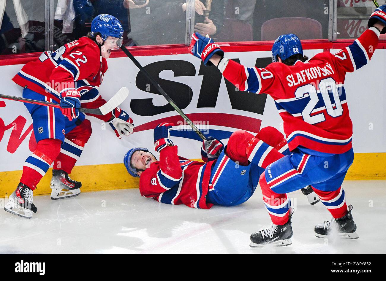 Montreal Canadiens' Mike Matheson (8) celebrates with Cole Caufield (22 ...