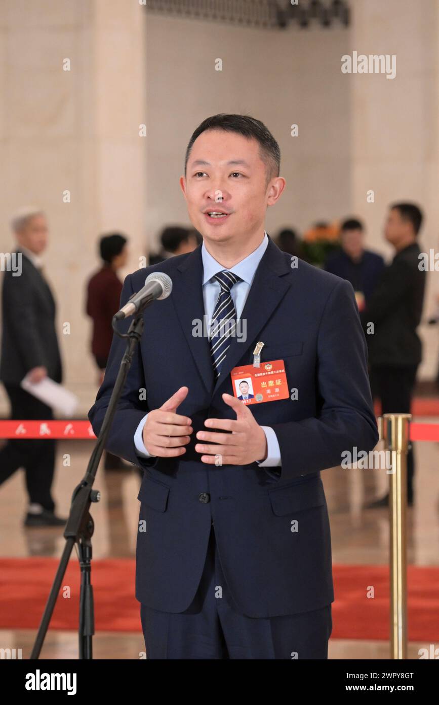Beijing, China. 10th Mar, 2024. Zhou Yuan, a member of the 14th ...