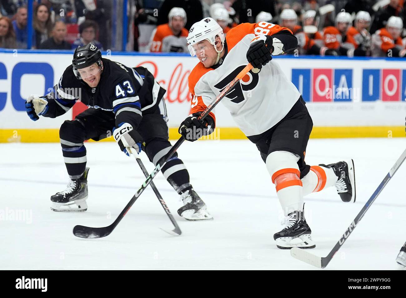 Philadelphia Flyers right wing Cam Atkinson (89) shoots past Tampa Bay ...