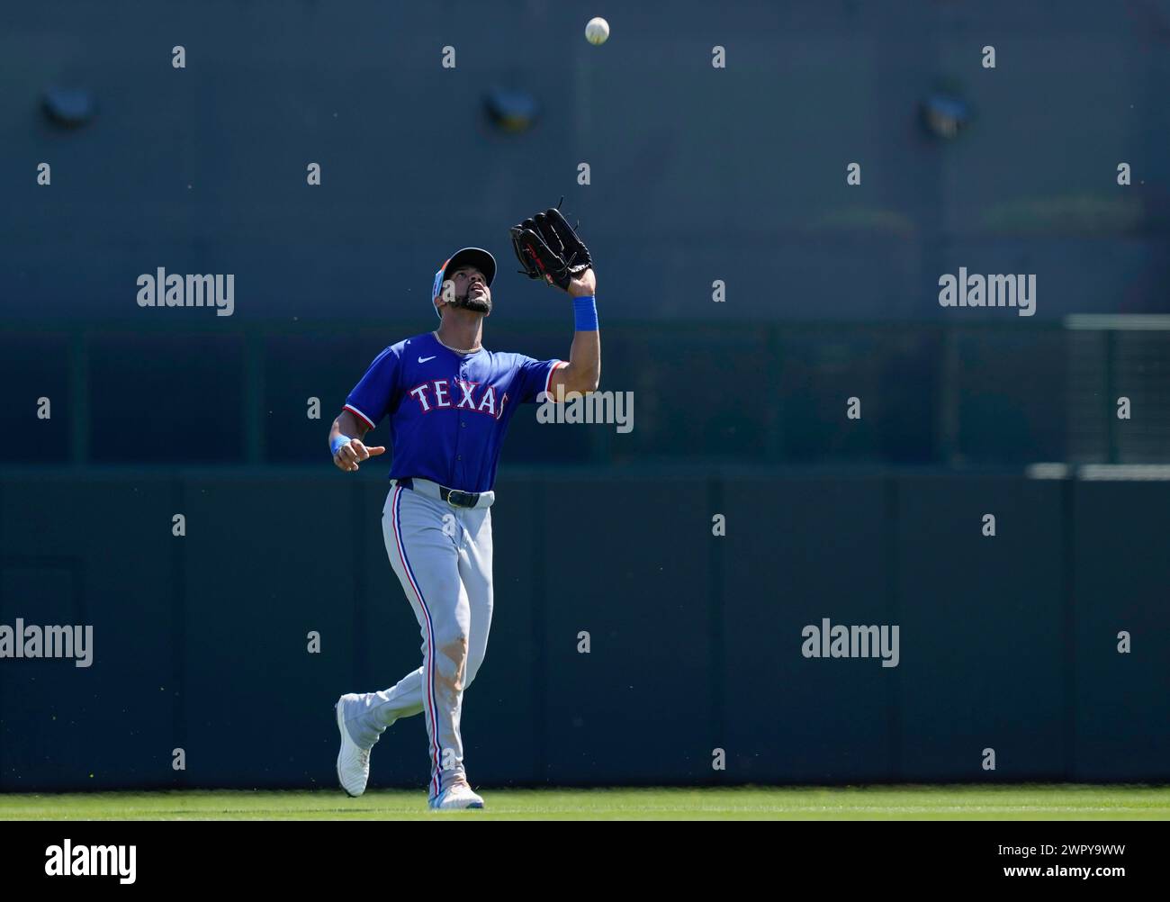 Texas Rangers center fielder Leody Taveras catches a fly ball hit by ...