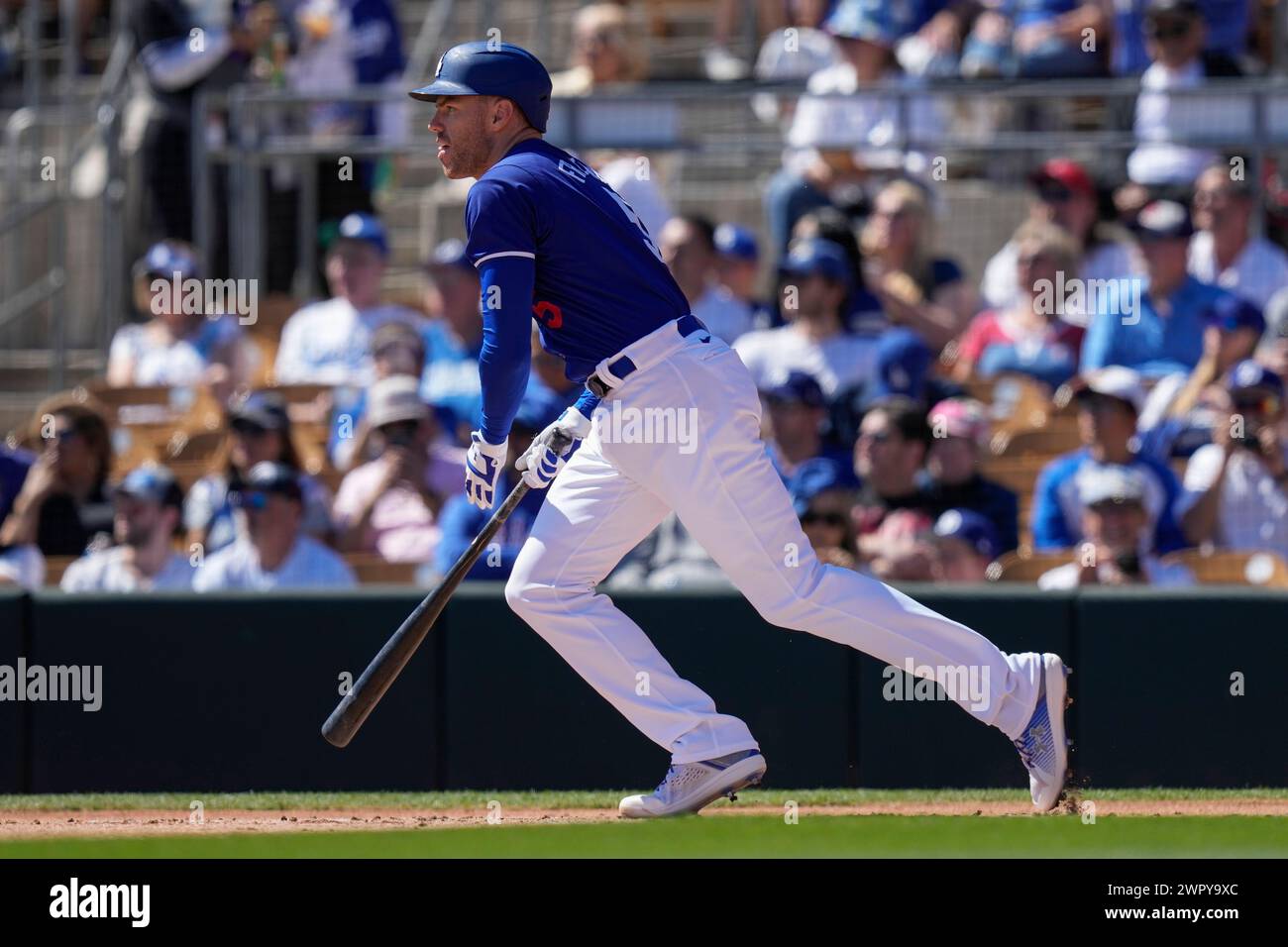 Los Angeles Dodgers' Freddie Freeman starts his run to first base after ...