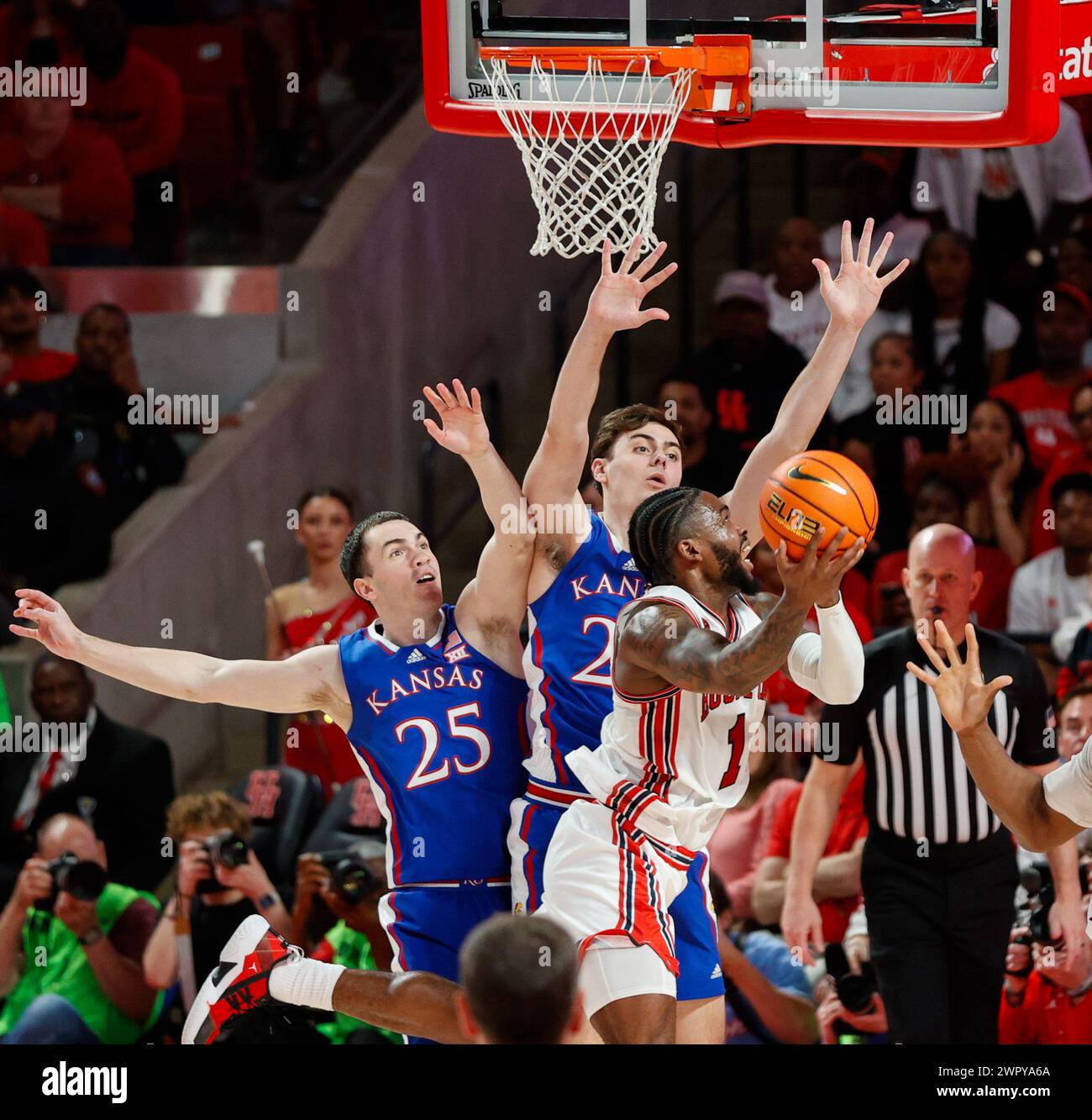 March 9, 2024: Houston guard Jamal Shead (1) shoots the ball against ...