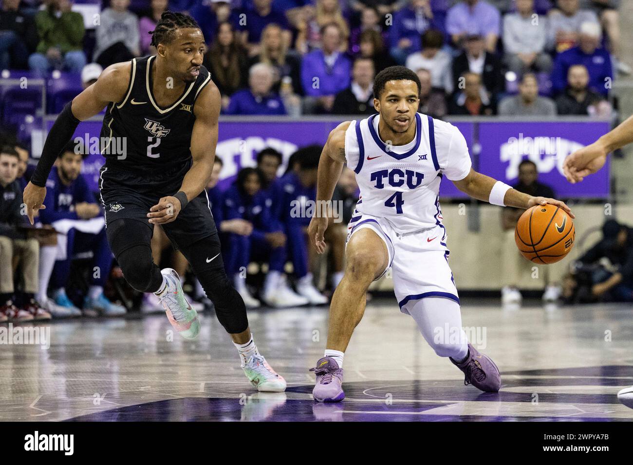 TCU guard Jameer Nelson Jr. (4) drives against Central Florida guard ...