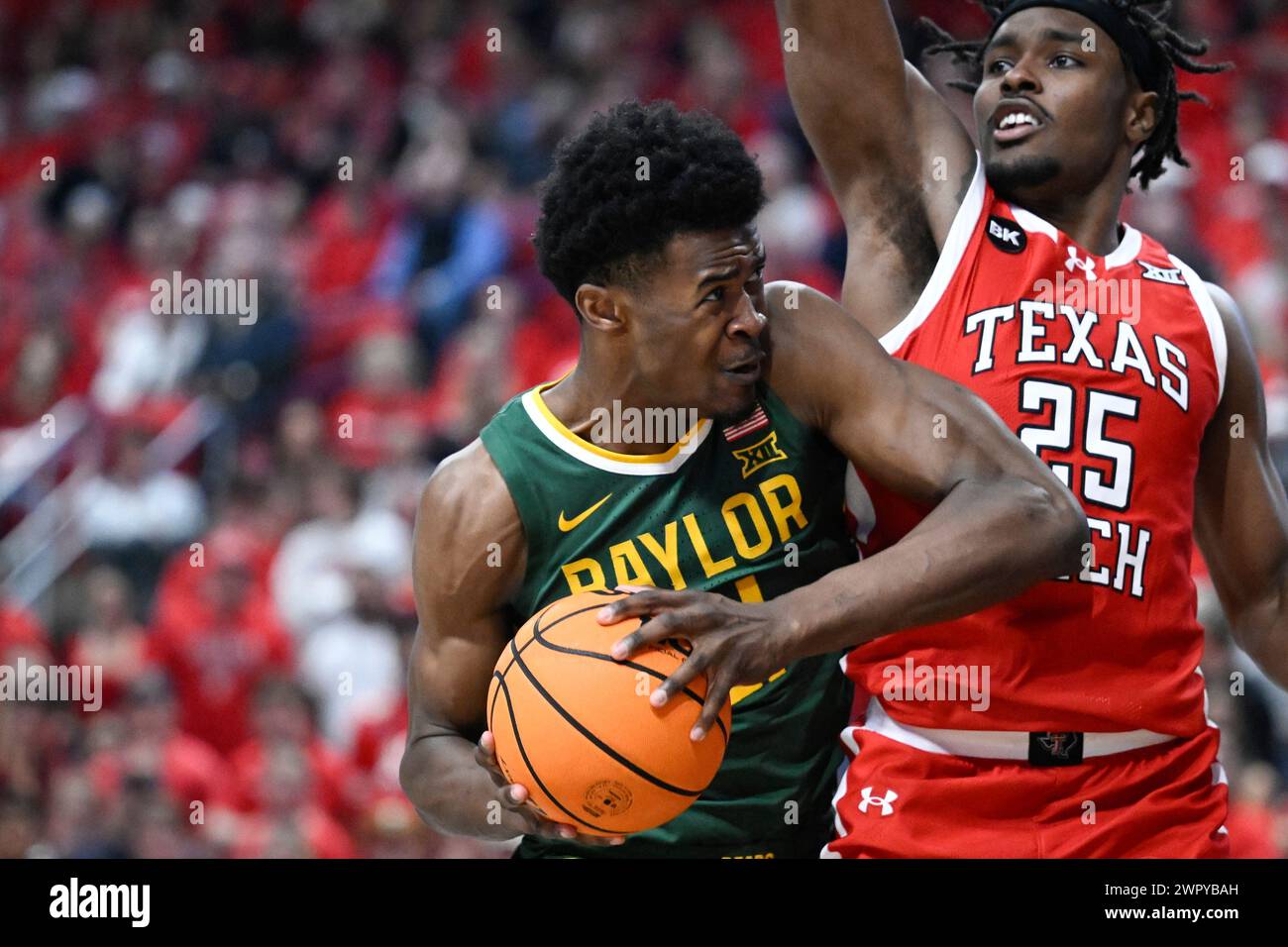 Baylor center Yves Missi, left, drives to the basket against Texas Tech ...