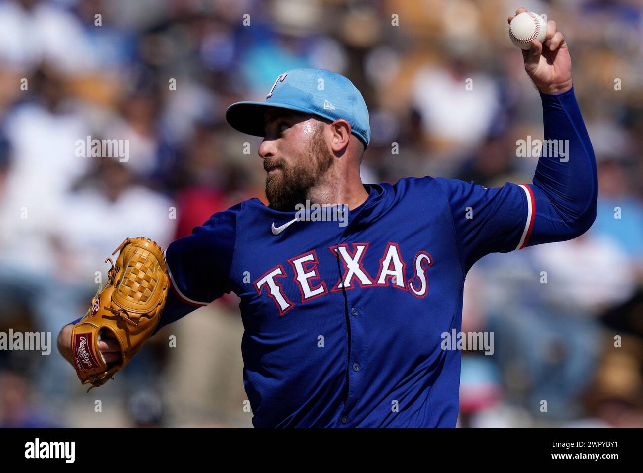 Texas Rangers pitcher Blake Taylor throws in the third inning of a ...