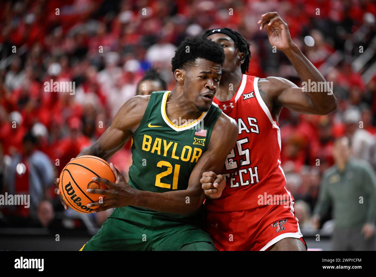 Baylor center Yves Missi (21) drives to the basket against Texas Tech ...