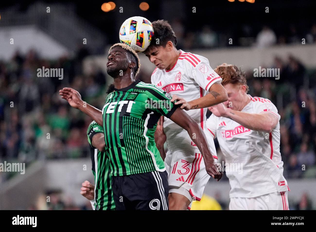 Austin FC forward Gyasi Zardes, left, and St. Louis City defender ...