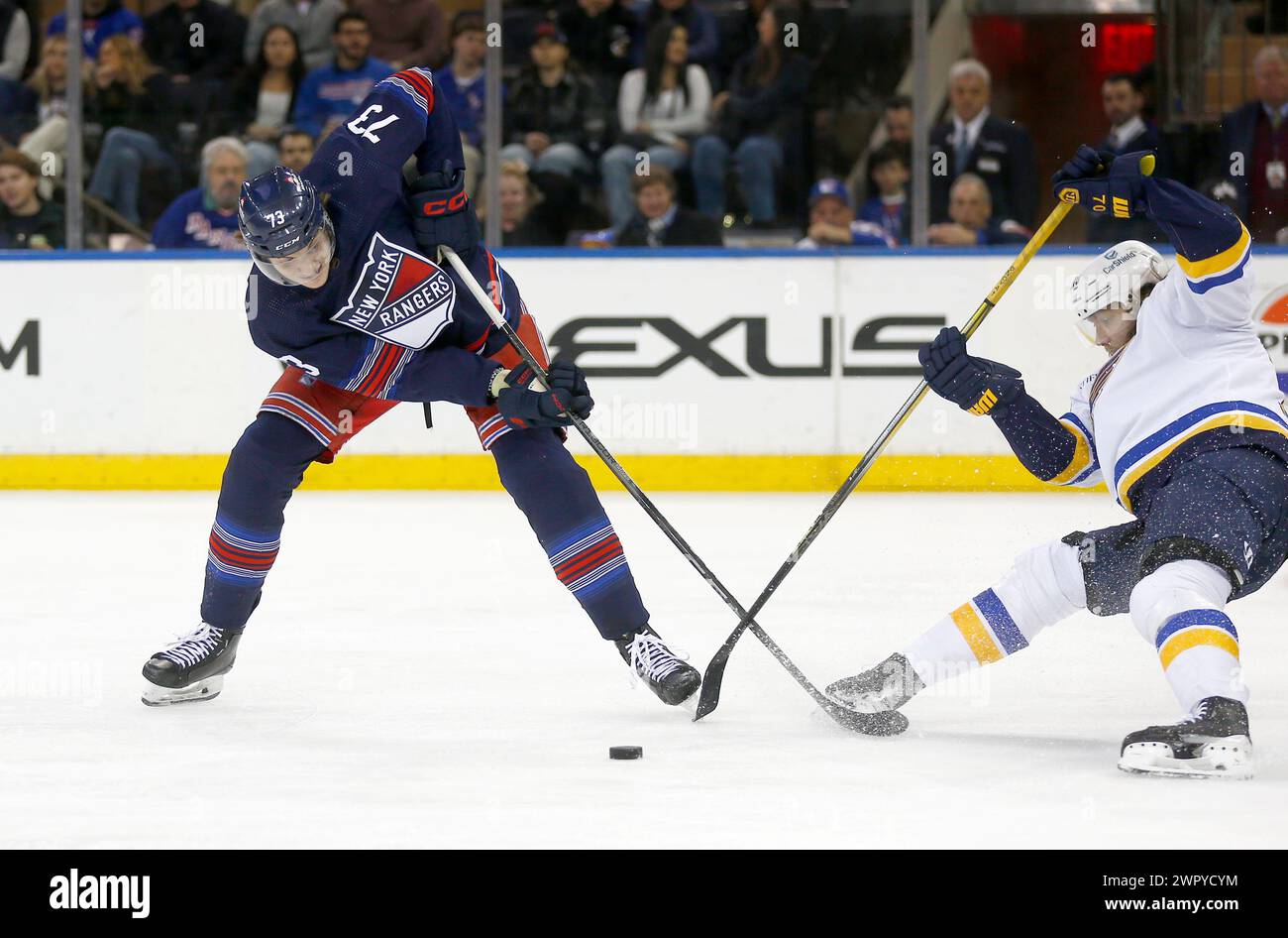 New York Rangers center Matt Rempe, left, and St. Louis Blues center ...
