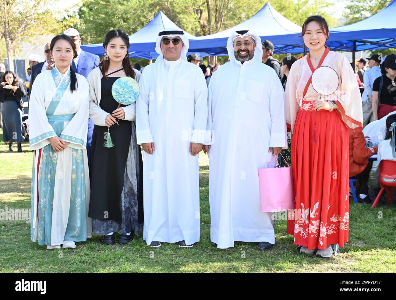 Capital Governorate, Kuwait. 9th Mar, 2024. Kuwaiti people pose for a group photo with women ...