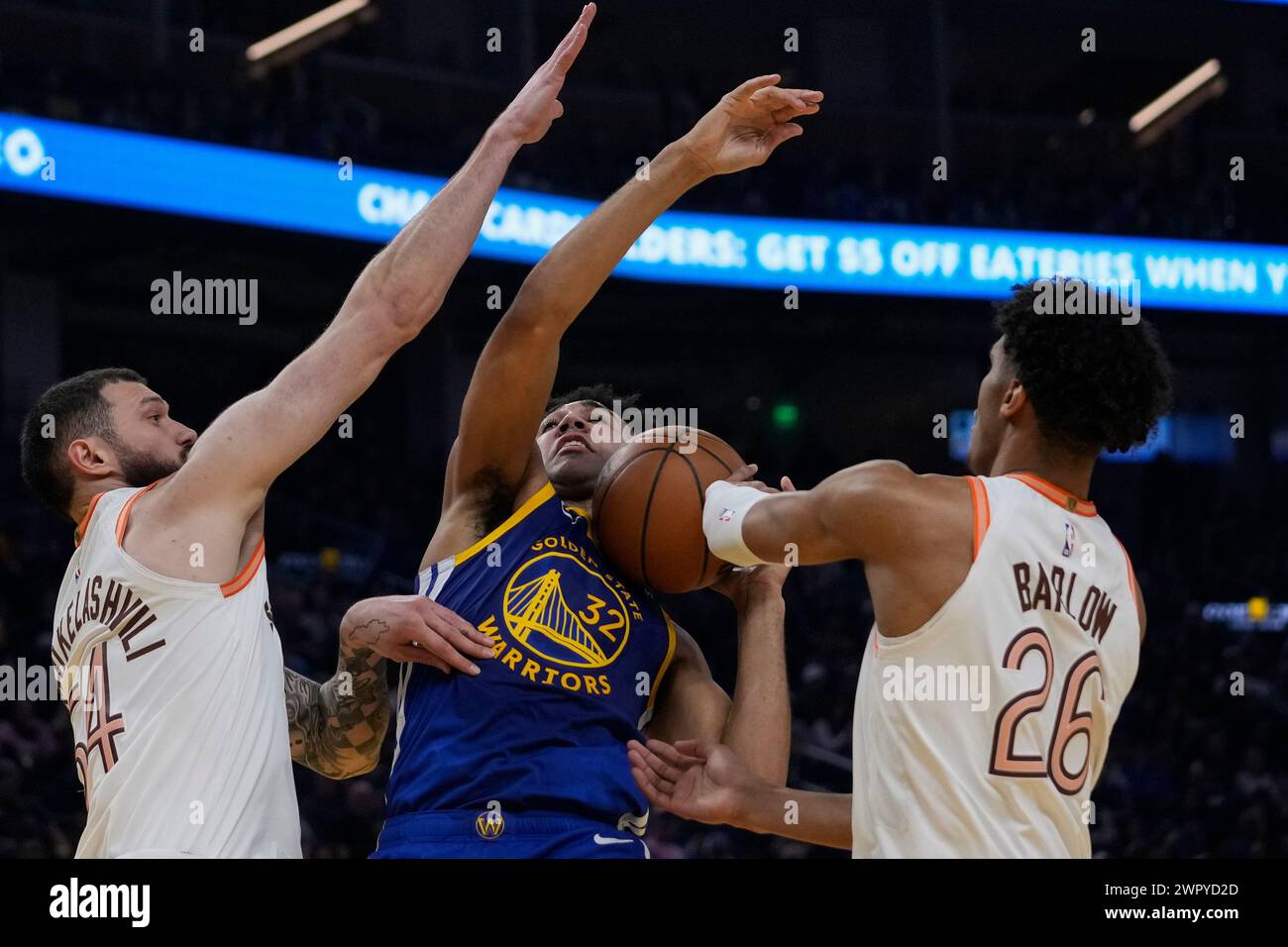 Golden State Warriors center Trayce Jackson-Davis (32) is fouled by San ...