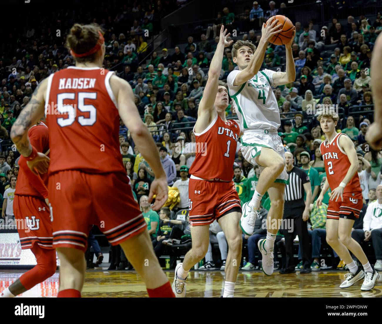 Oregon guard Brennan Rigsby (4) shoots against Utah forward Ben Carlson ...