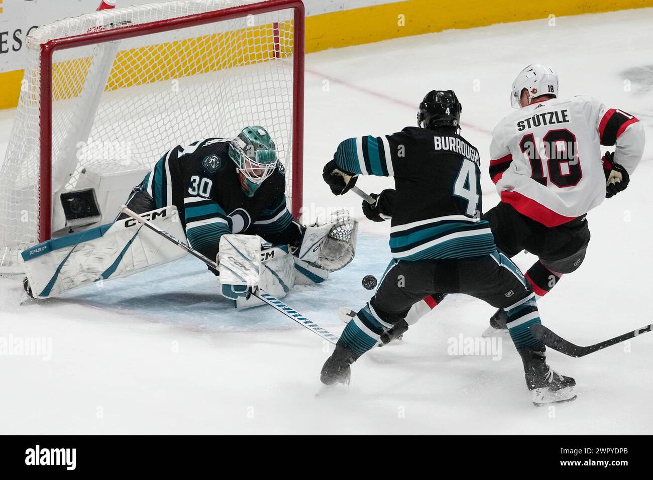 San Jose Sharks goaltender Magnus Chrona (30) reaches for the puck next ...