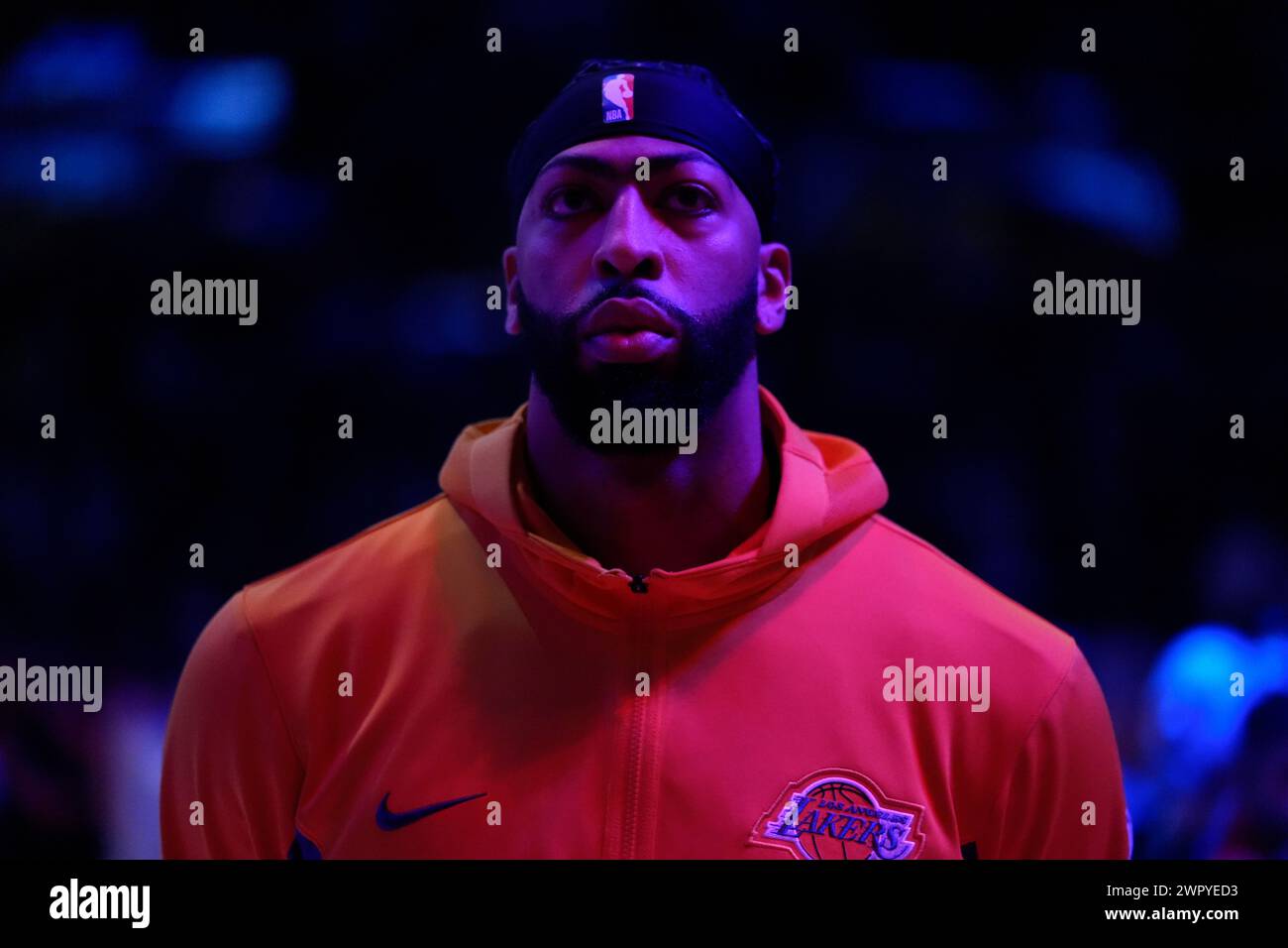 Los Angeles Lakers forward Anthony Davis listens to the national anthem ...