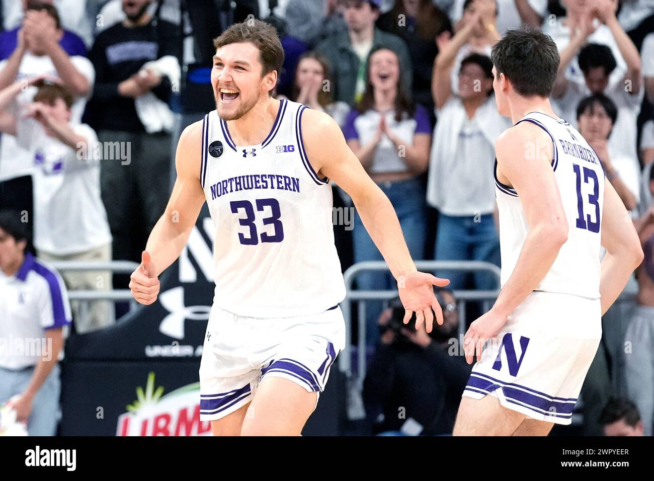 Northwestern forward Luke Hunger (33) smiles after scoring during the ...