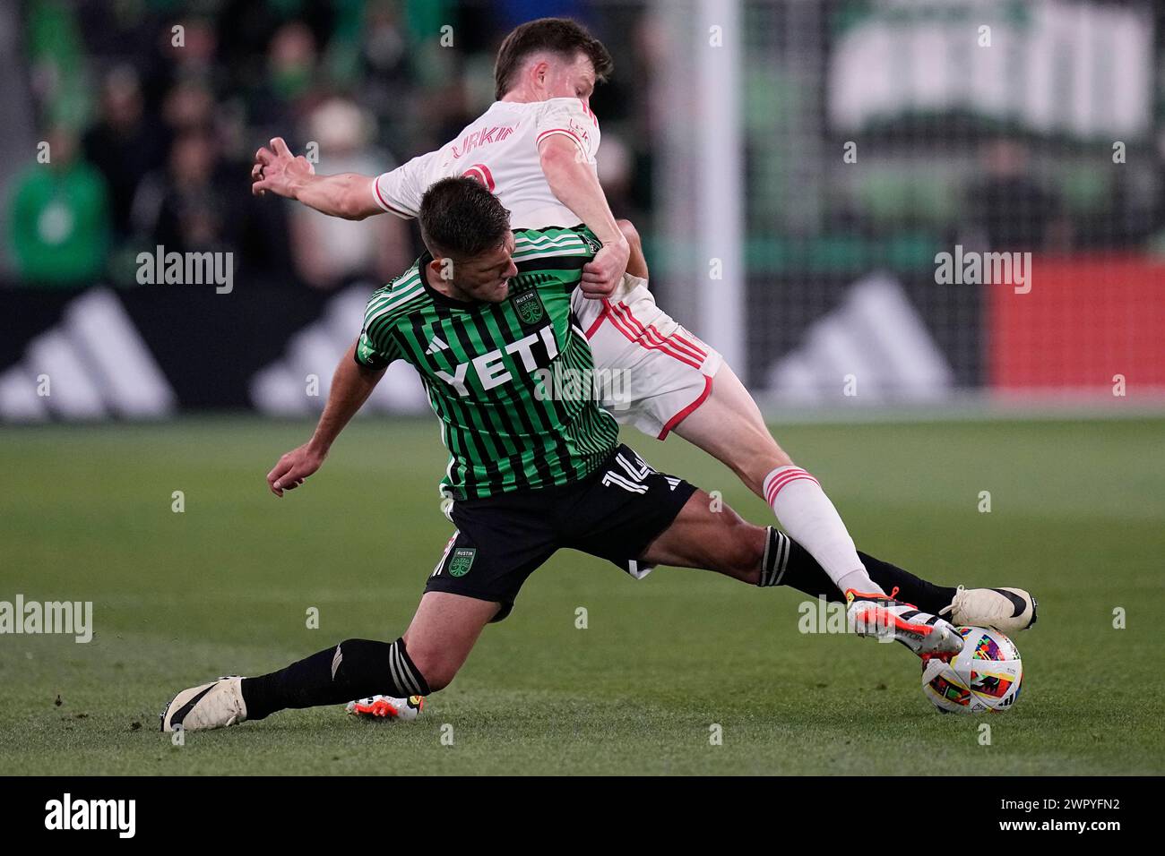 Austin FC forward Diego Rubio (14) and St. Louis City midfielder Chris ...