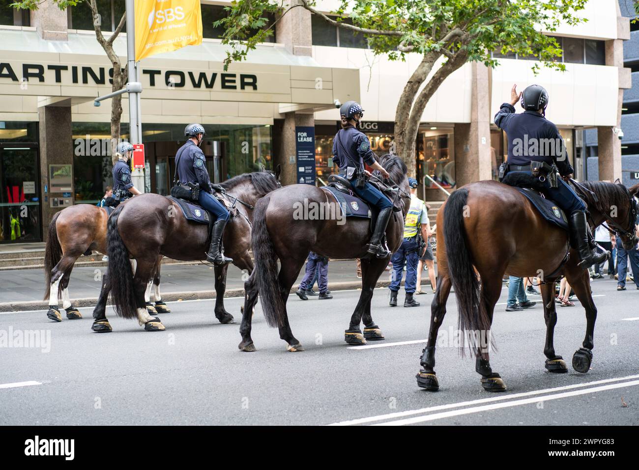 Mounted police monitor demonstrators during a Sydney march supporting ...