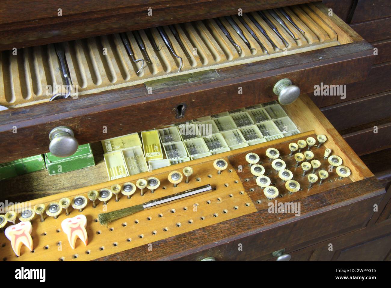 A historic dental cabinet with a display of instruments Stock Photo - Alamy