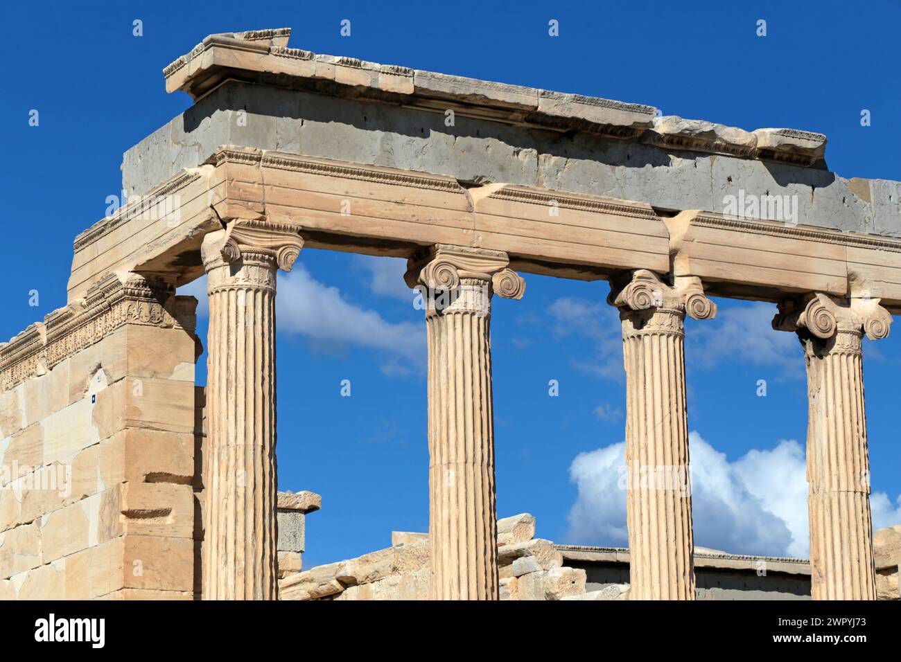 Up view to The Propylaea columns, the monumental gateway that serves as the entrance to the ...
