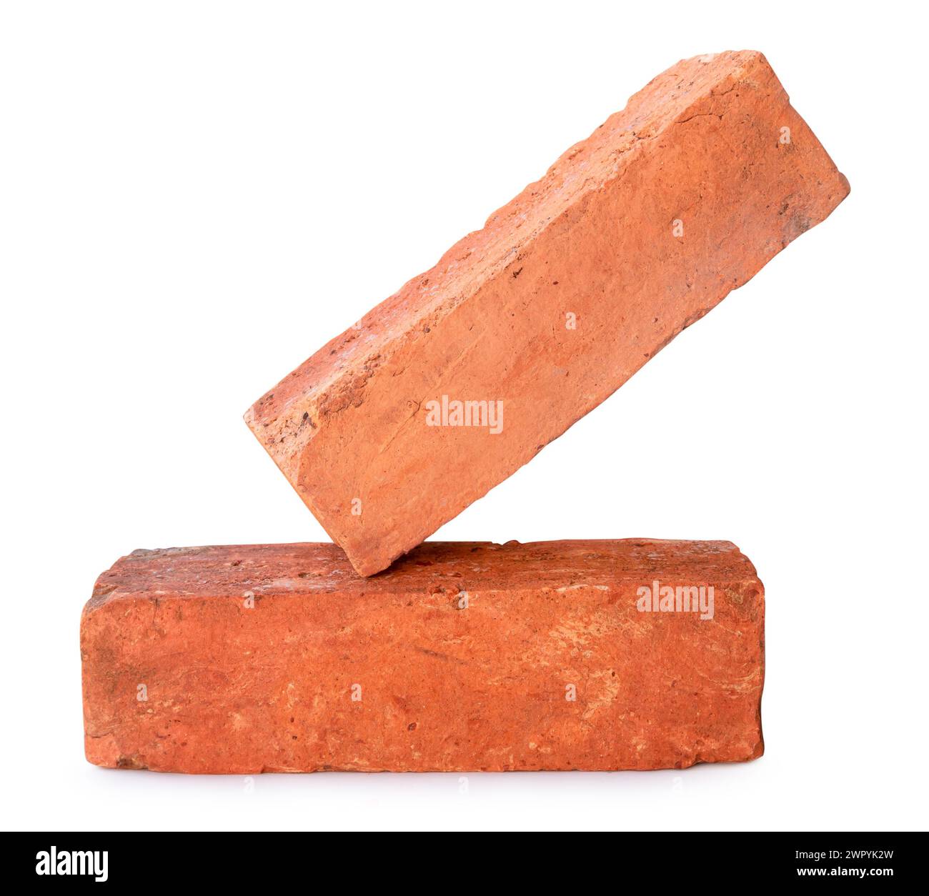 Side view of old red or orange bricks in stack is isolated on white ...