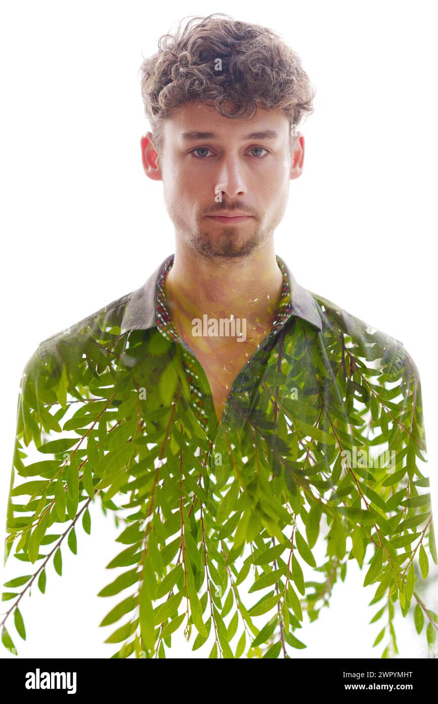 A double exposure male portrait merged with green leaves at the bottom ...