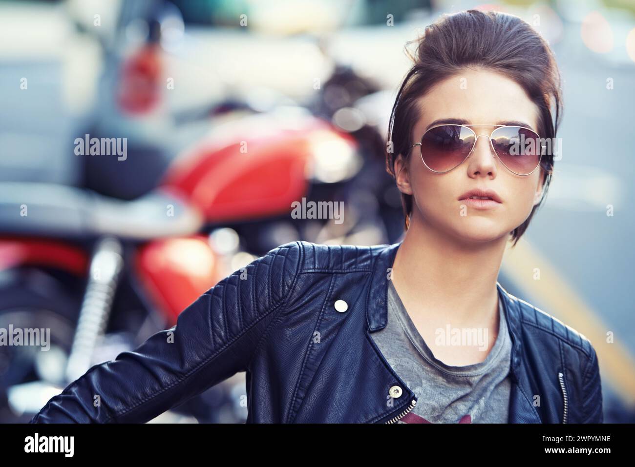 Woman pose motorcycle hi-res stock photography and images - Alamy