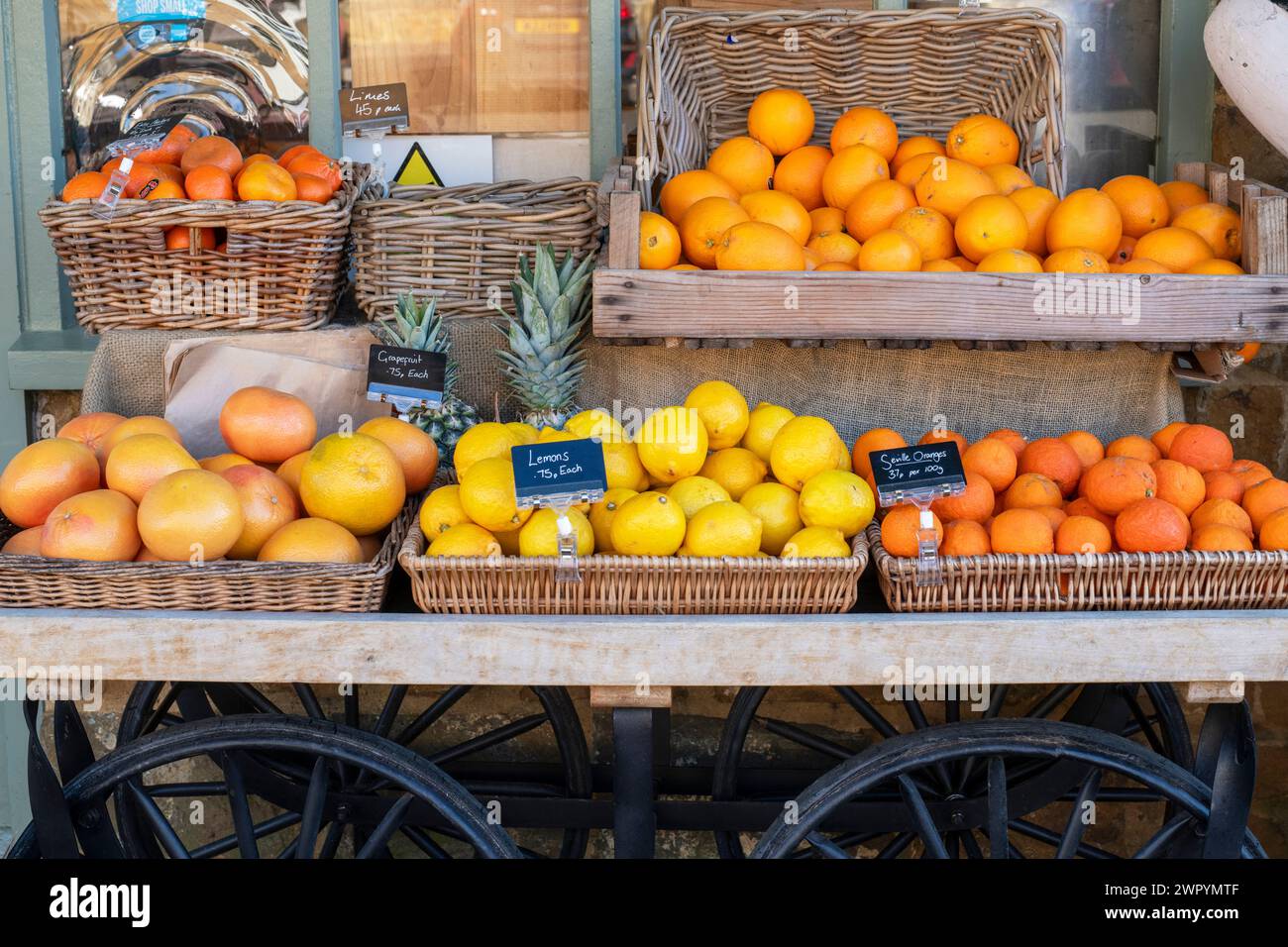 Oranges, lemons, grapefruit for sale on a cart outside Eagles Fine ...