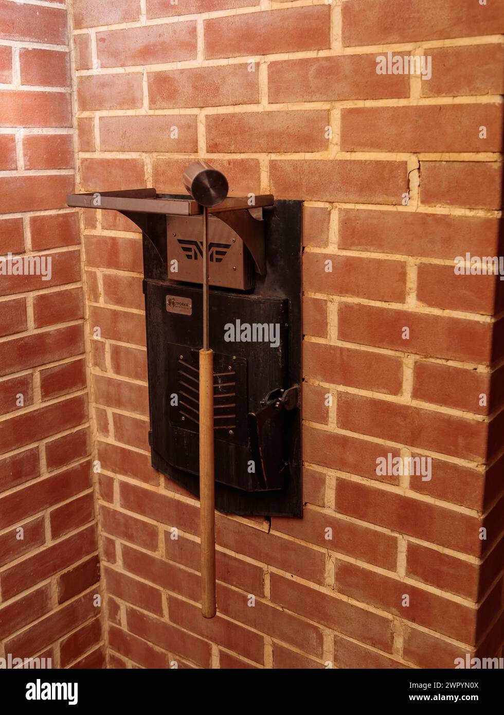 An image of a Russian brick stove in a sauna, revealing the grandeur of ...