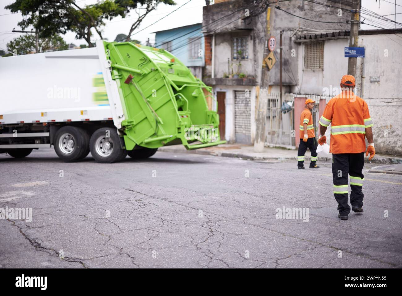 Teamwork, truck and garbage collection for cleaning and disposal in ...