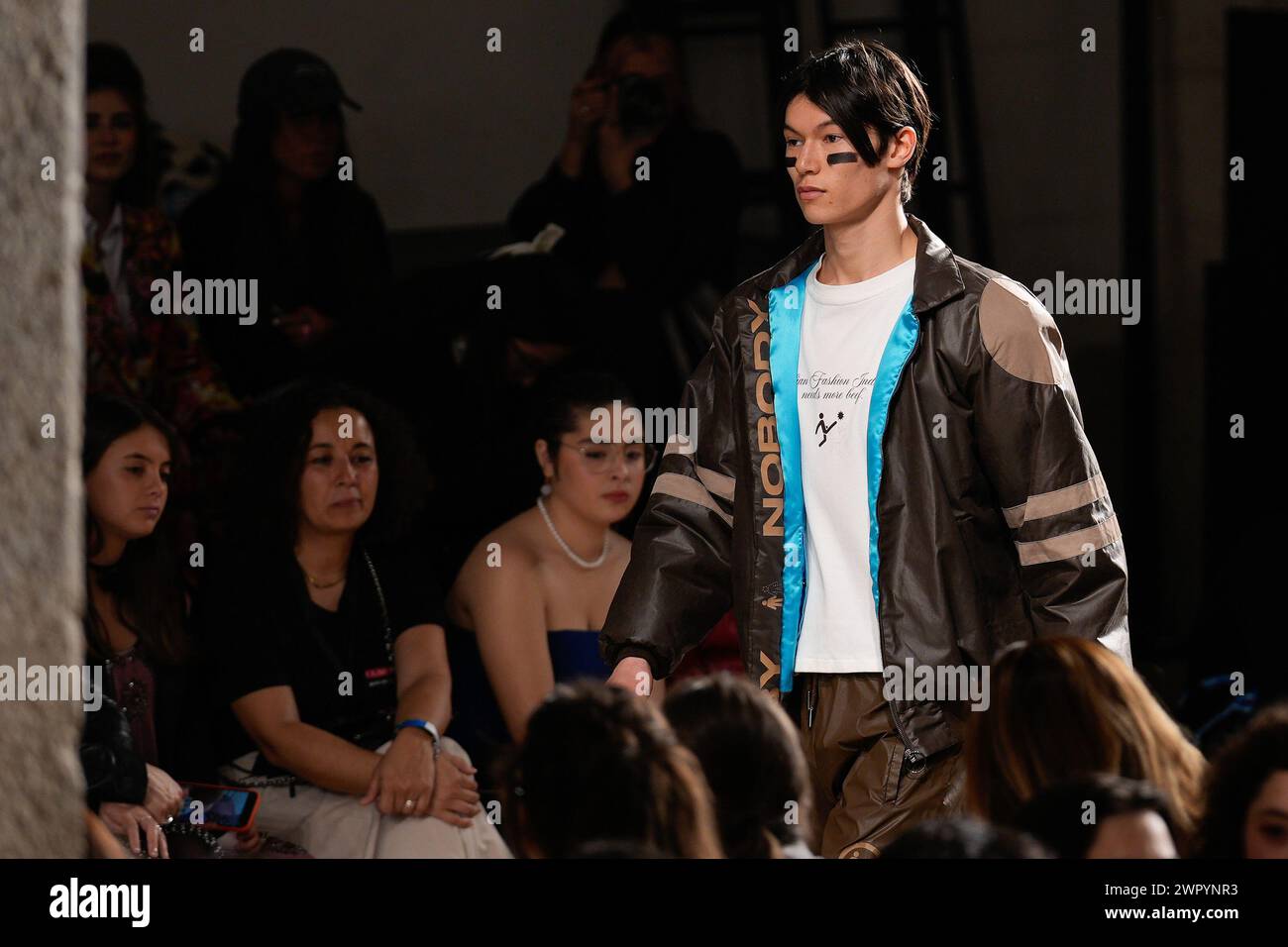 A model walks the runway during the IED Graduates fashion show at ...