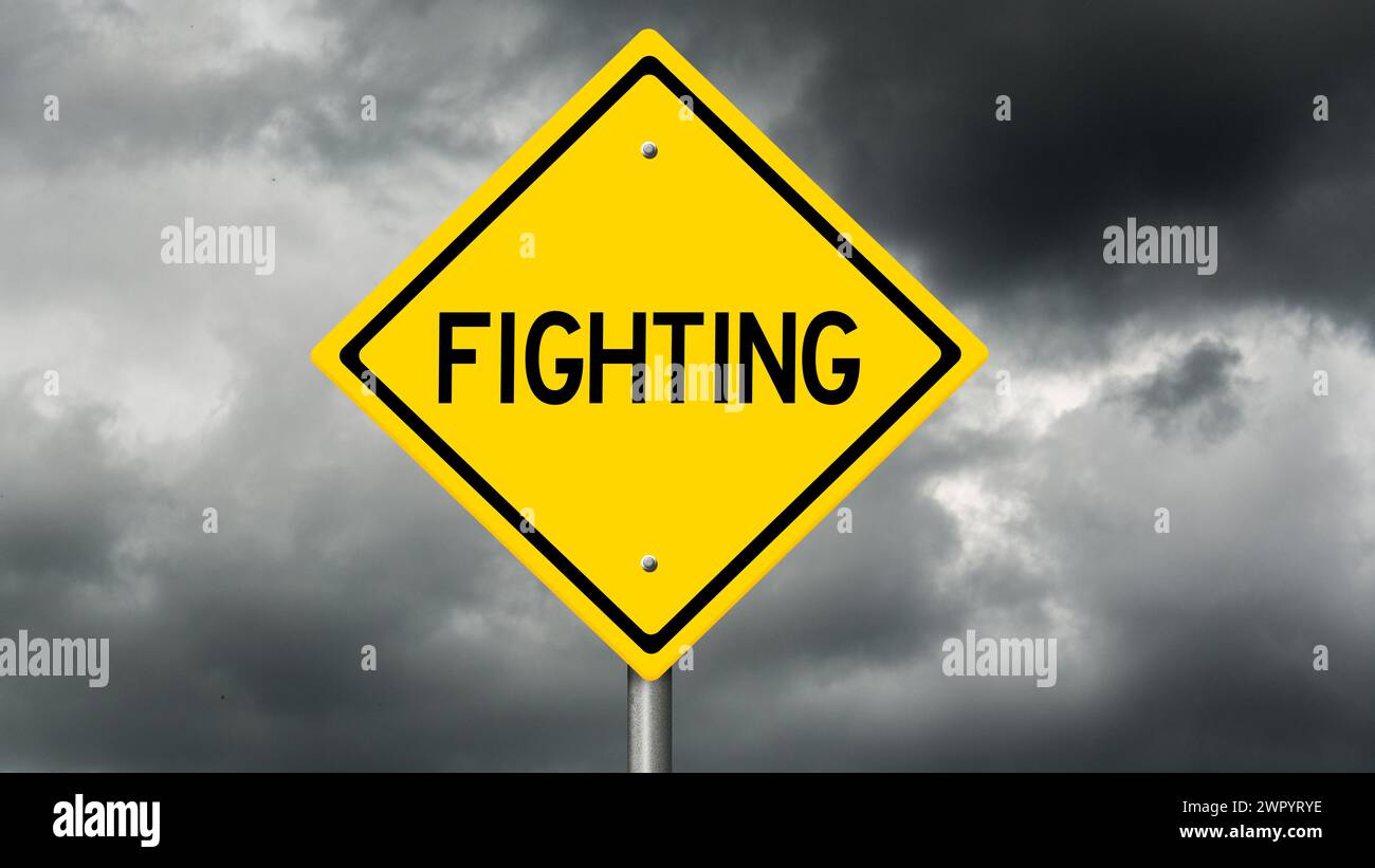 Yellow diamond-shaped highway warning sign for FIGHTING Stock Photo - Alamy