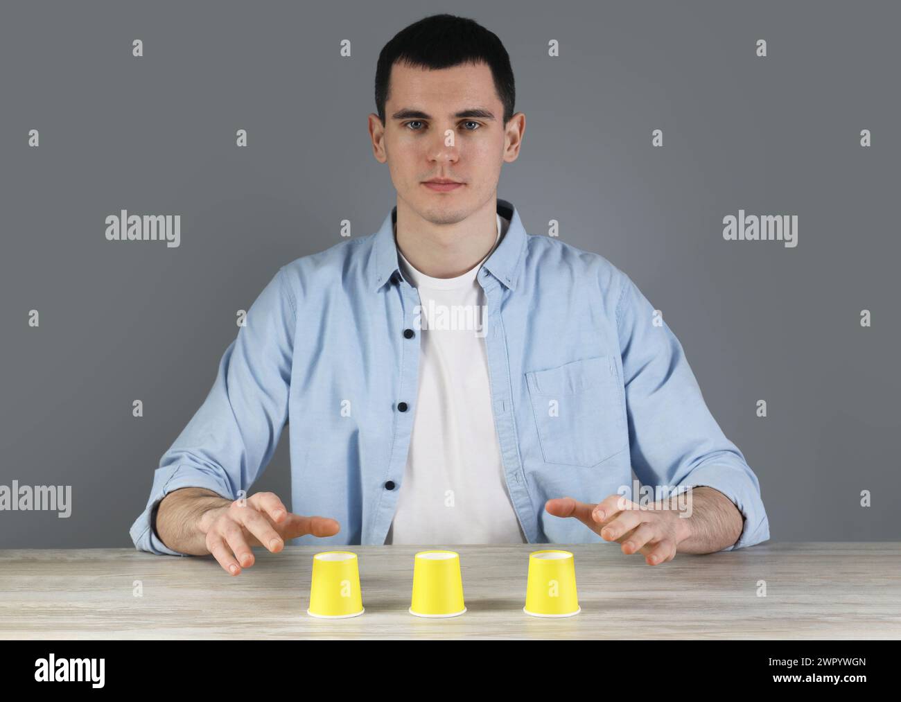 Man magician table hi-res stock photography and images - Alamy